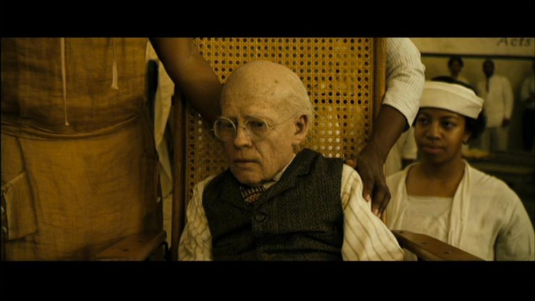 The Curious Case of Benjamin Button movie poster with a man aging ...